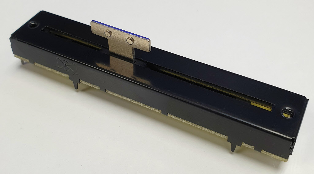 N-Alps 60mm 10kA (log) stereo fader